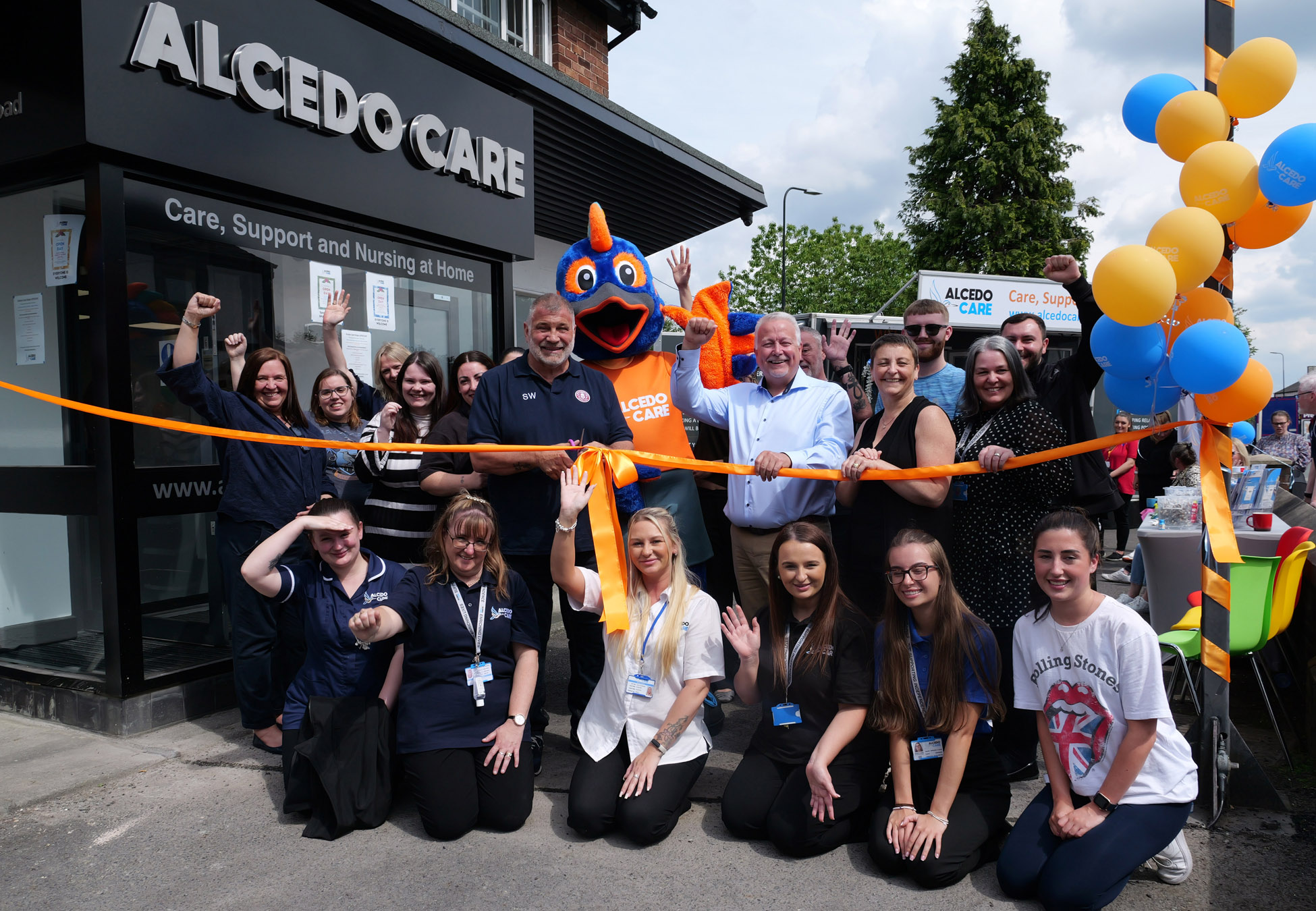 Alcedo Care's new office opened by Wigan Warrior Shaun Wane